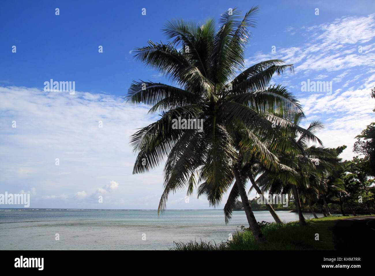 Blue sky and road on the sea coast in Upolu, Samoa Stock Photo - Alamy