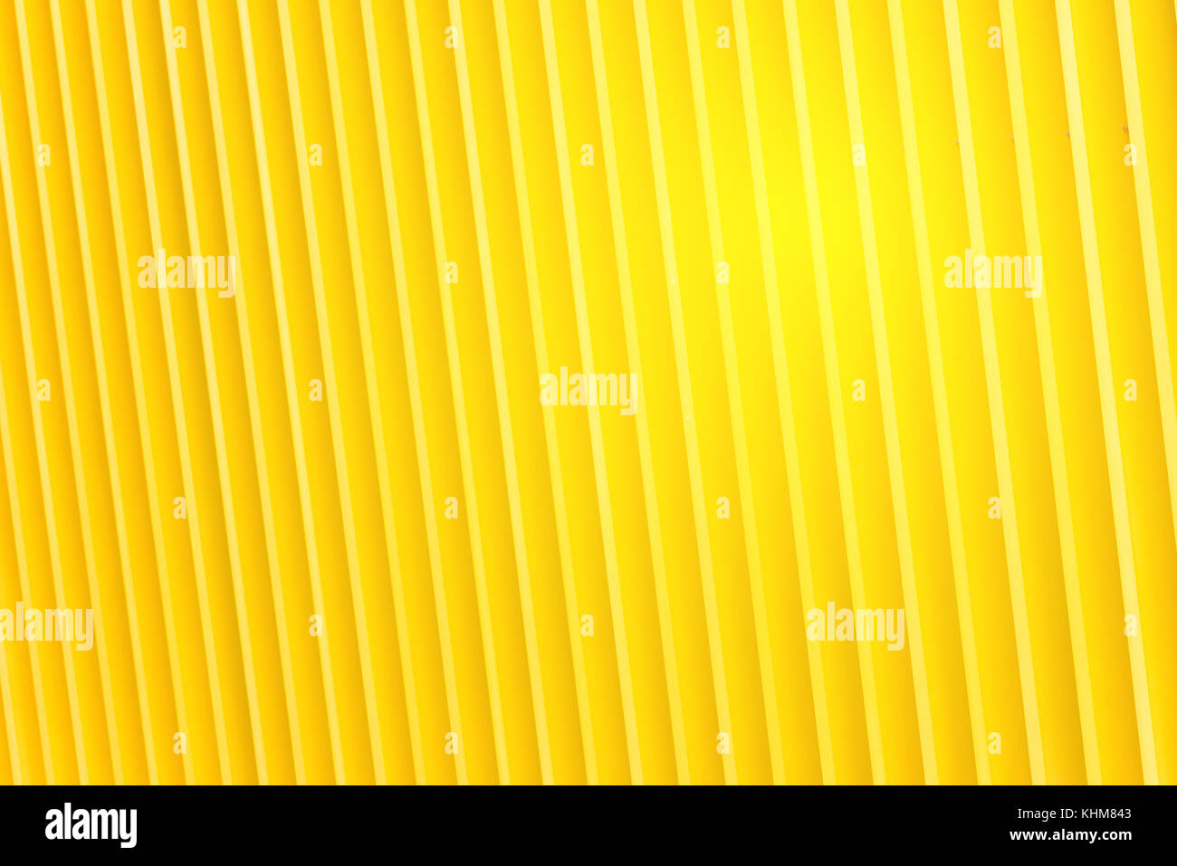 Detail of bright yellow metal building facade. For background Stock ...