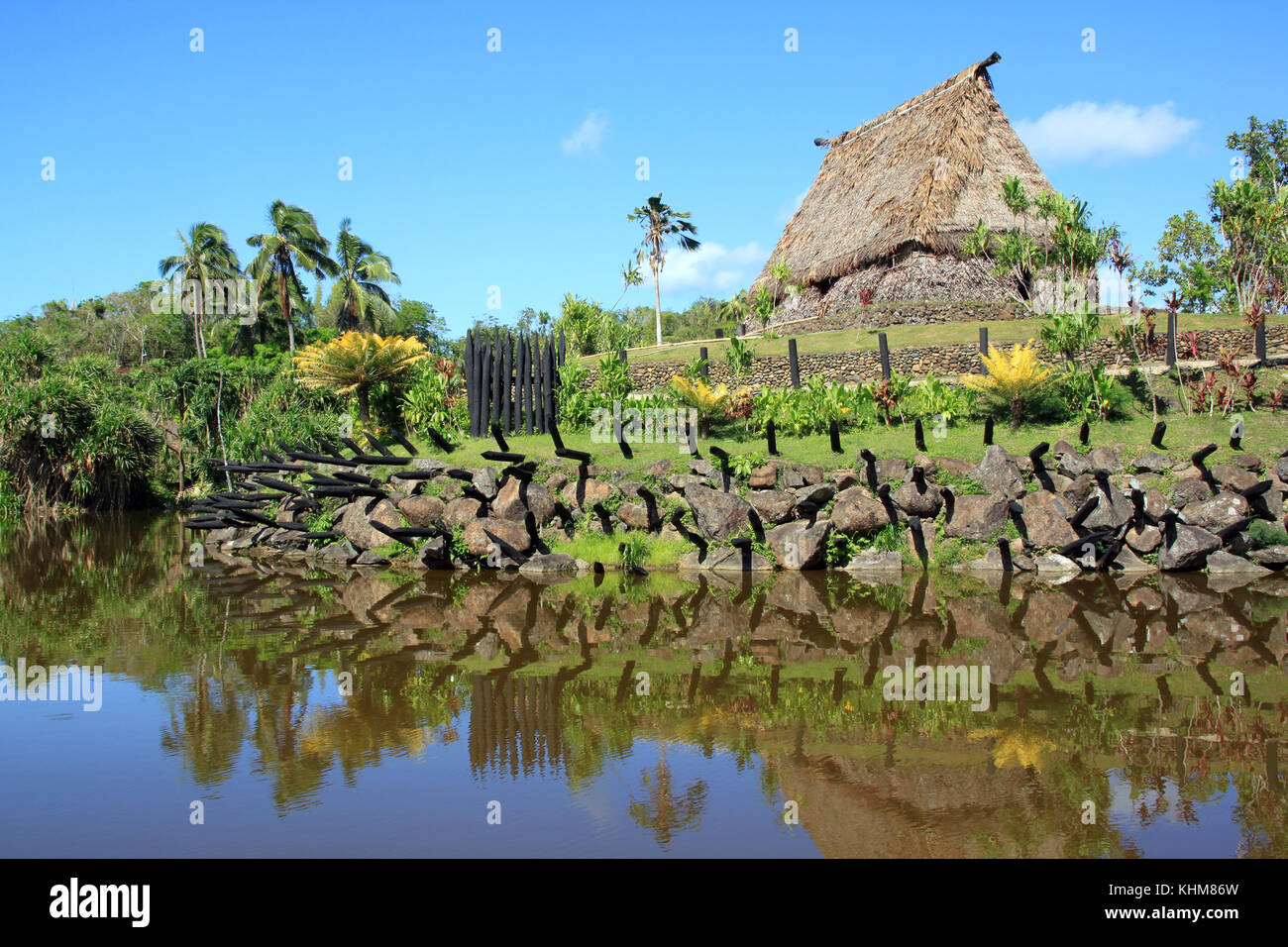 Old traditional house on the bank of river in Fiji Stock Photo - Alamy