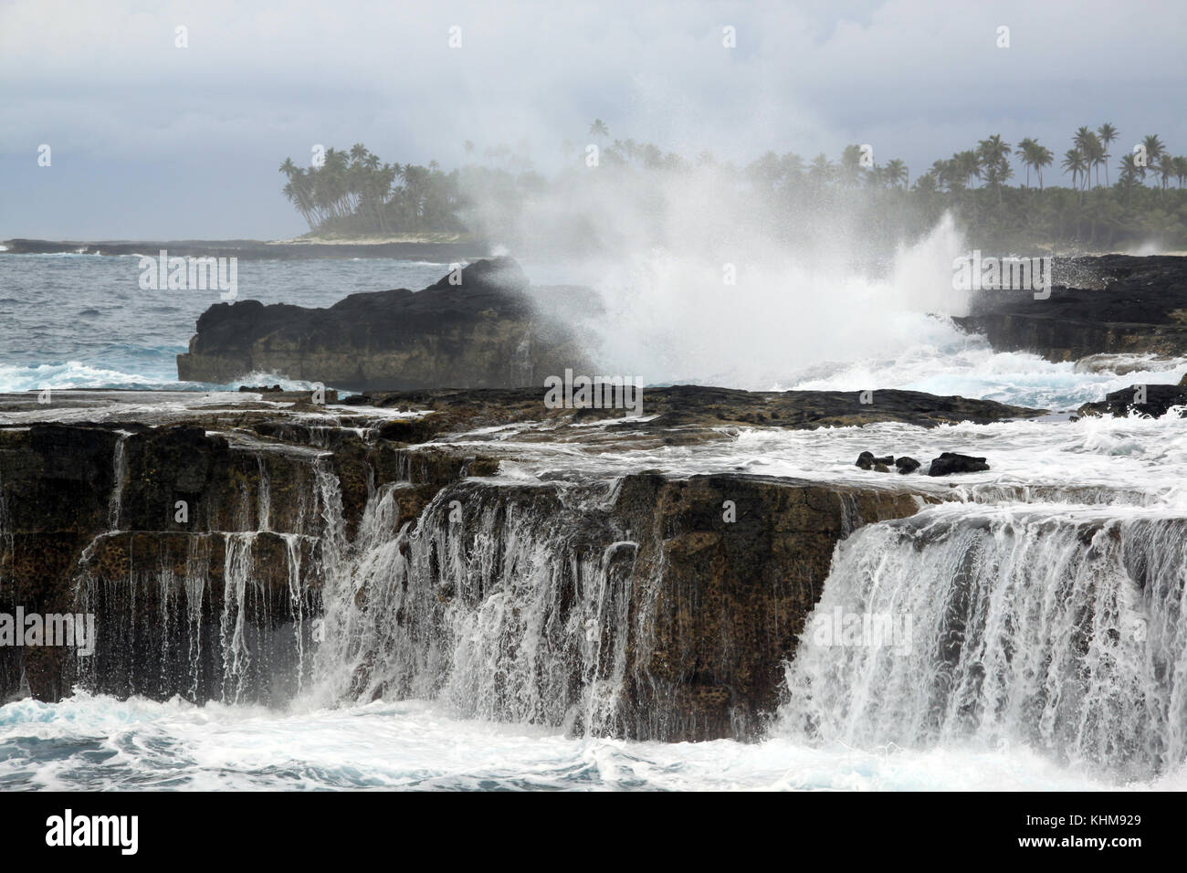 Rock and water on the coast in Samoa Stock Photo - Alamy