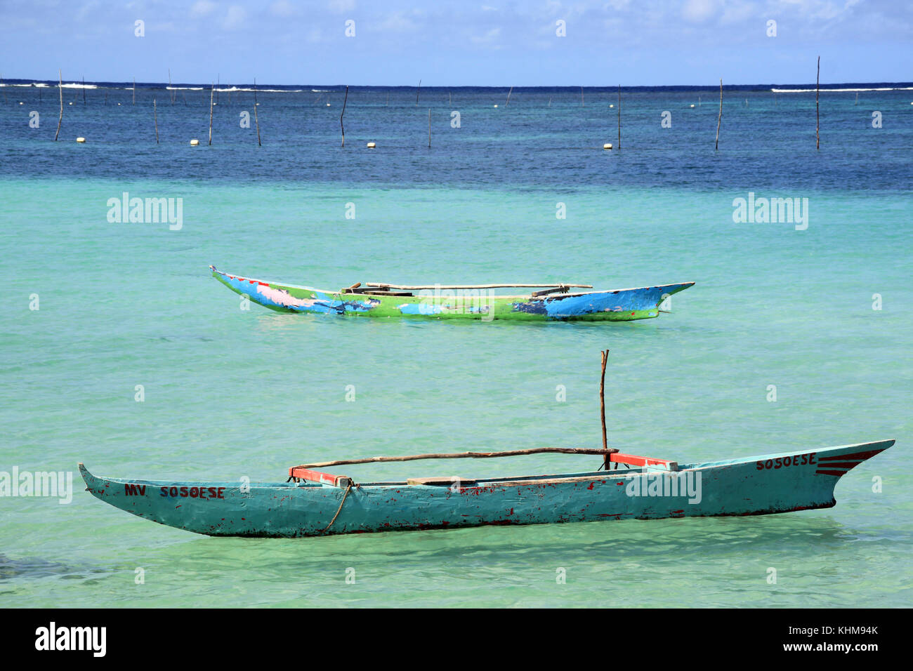 Two traditional wooden boats on the water in Upolu island, Samoa Stock ...