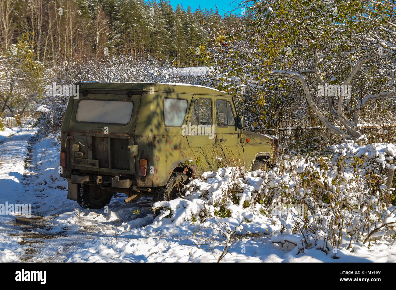 Unattended abandoned car in the woods on the nature Stock Photo - Alamy