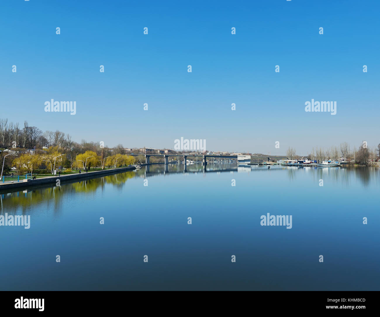 deep blue sky over river with bridge Stock Photo - Alamy