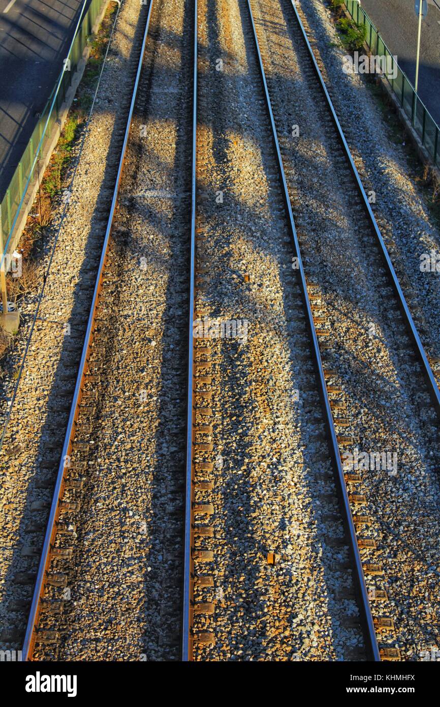 Train tracks at sunset Stock Photo - Alamy