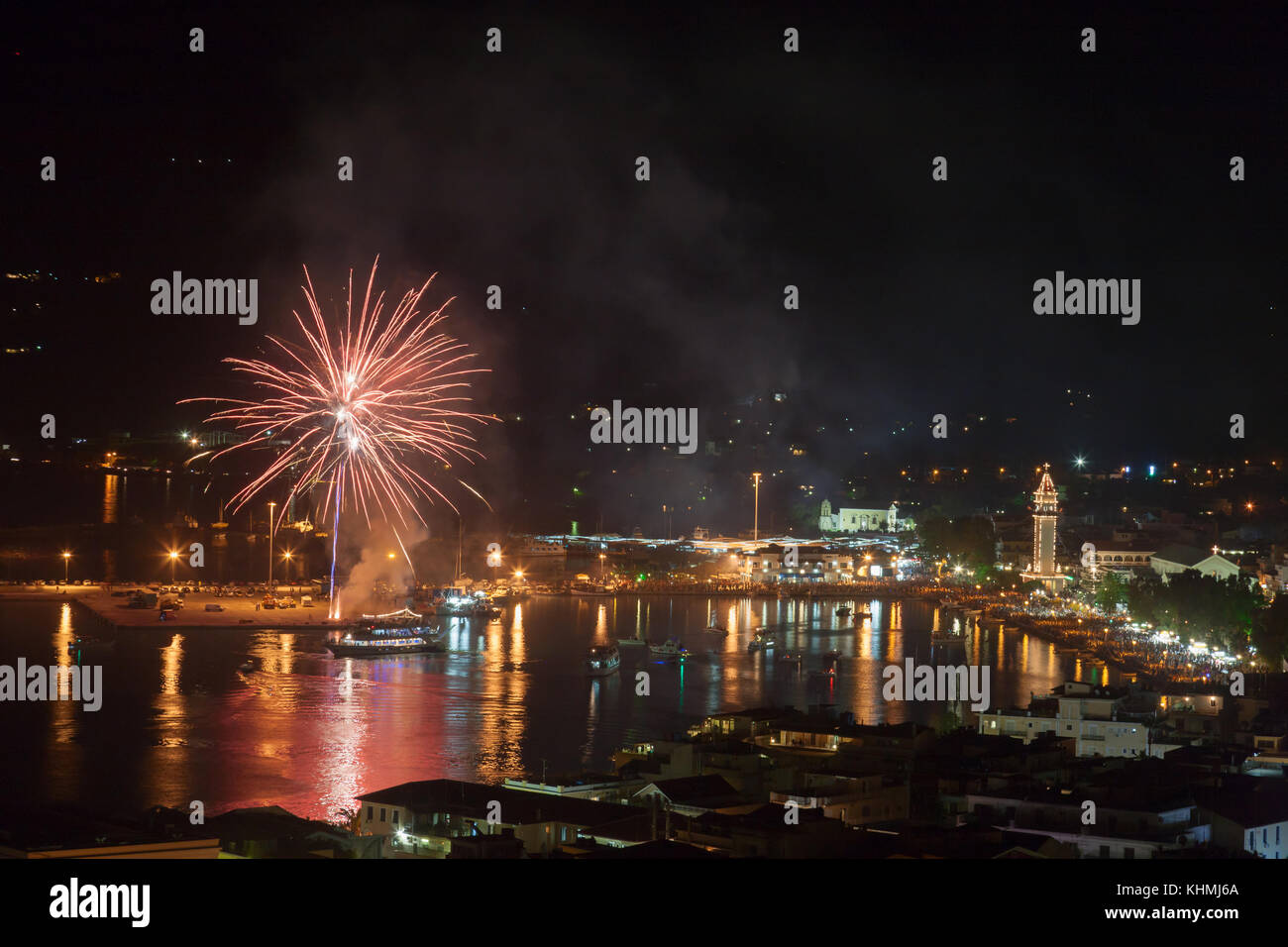 Greek island celebration with fireworks in the night sky Stock Photo ...