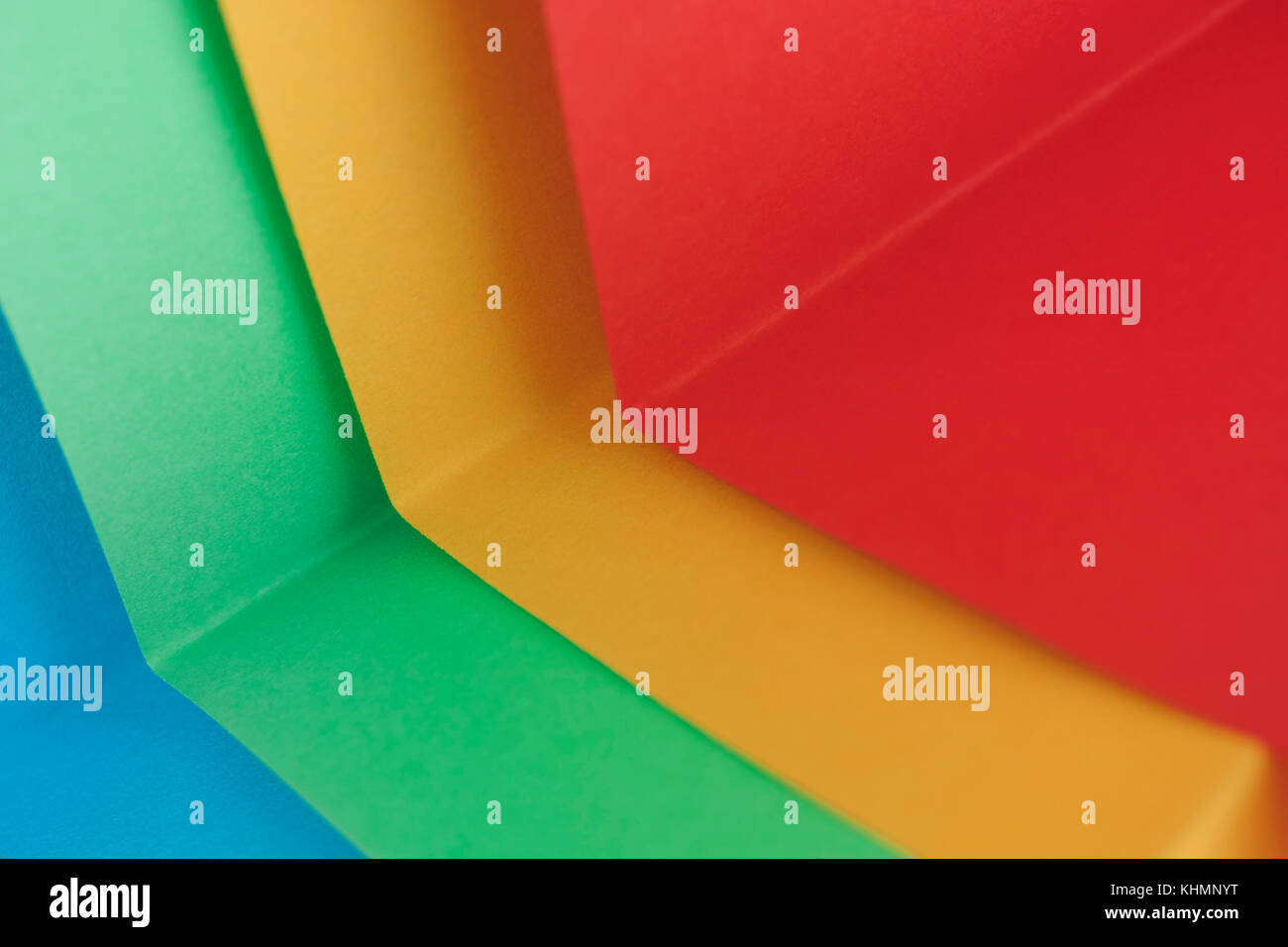 Colored paper background. Blue, Green, Yellow, Red. Close up Stock ...
