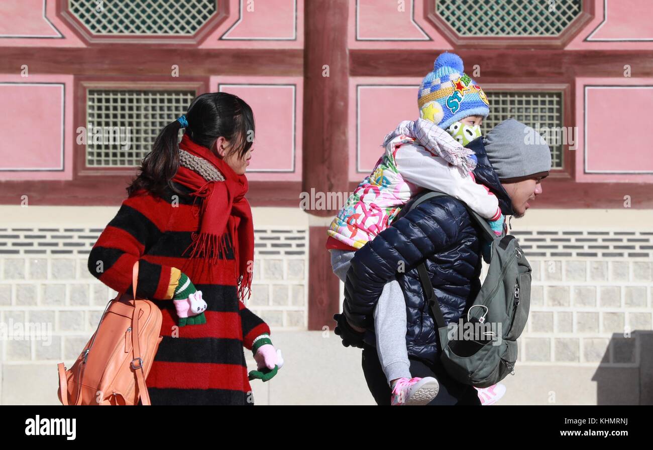 18th Nov, 2017. winter cold Tourists in thick winter clothes visits ...