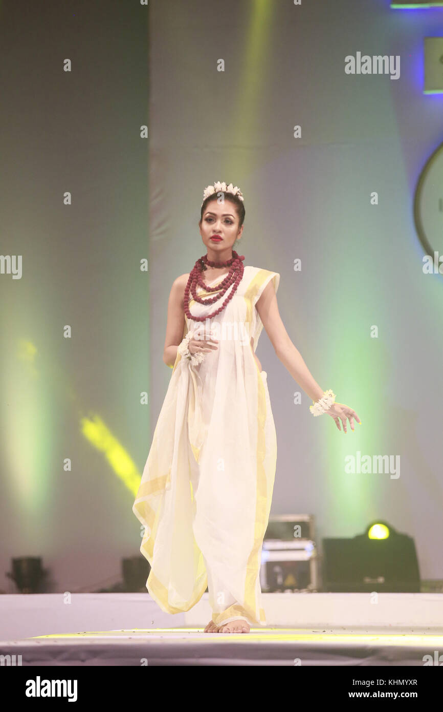 Dhaka, Bangladesh. 17th Nov, 2017. Bangladeshi models display cloths ...