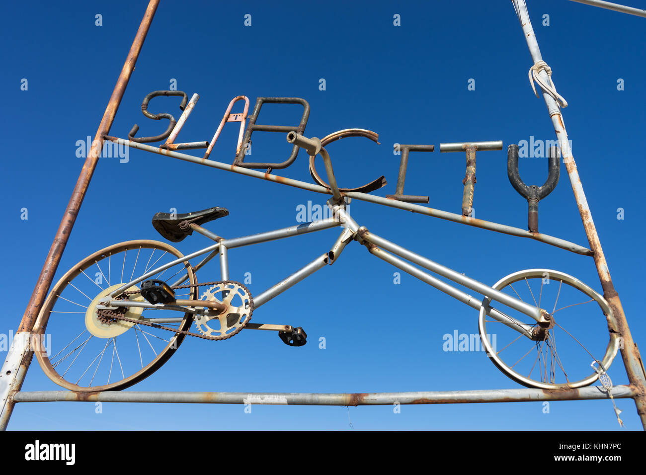 metal sign marking the lawless slab city in the desert of california ...