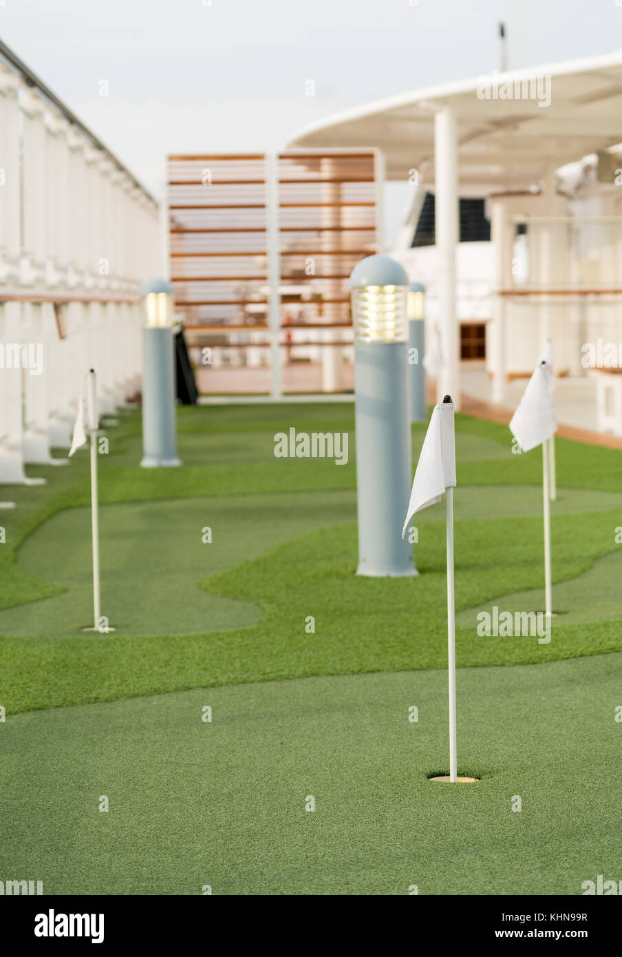 Artificial putting green course on cruise ship deck Stock Photo - Alamy