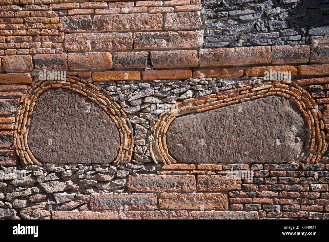 a mixture of building materials used in a wall in Mexico Stock Photo ...
