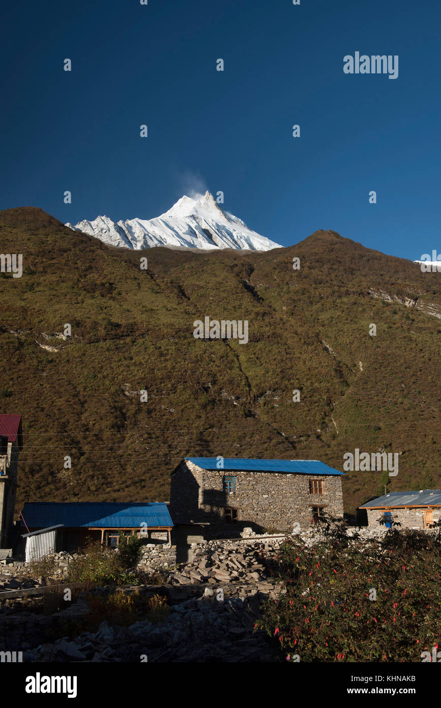 Manaslu, world's eighth highest peak (8,163 metres), rises from ...
