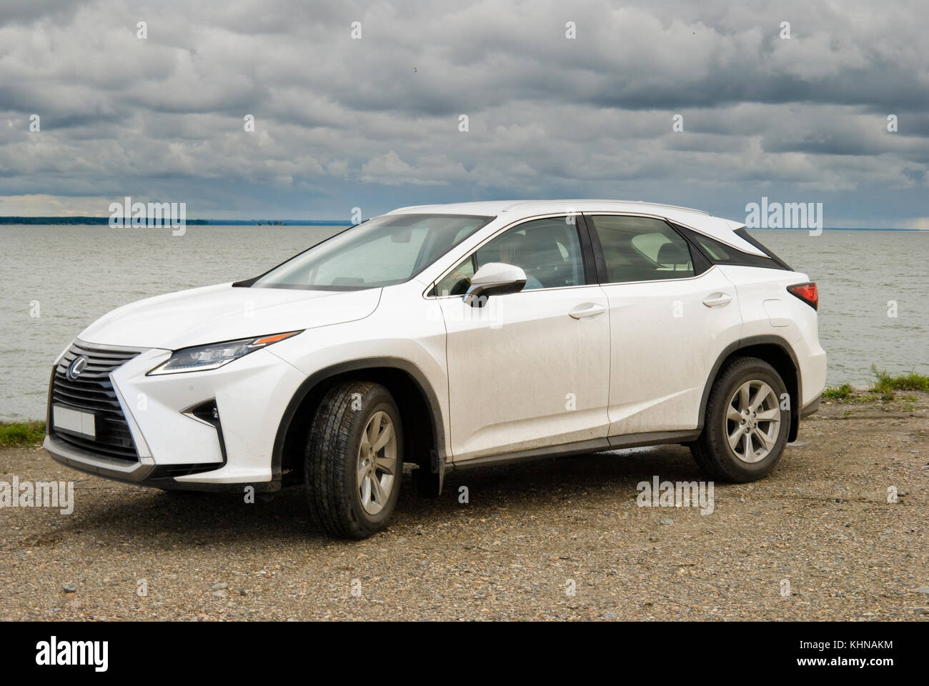 Lexus RX 200t against the background of thunderclouds Stock Photo - Alamy