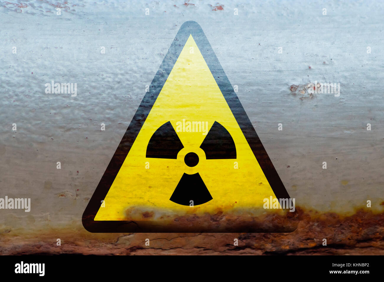 Radioactive radiation warning on the rusty container, image with a ...