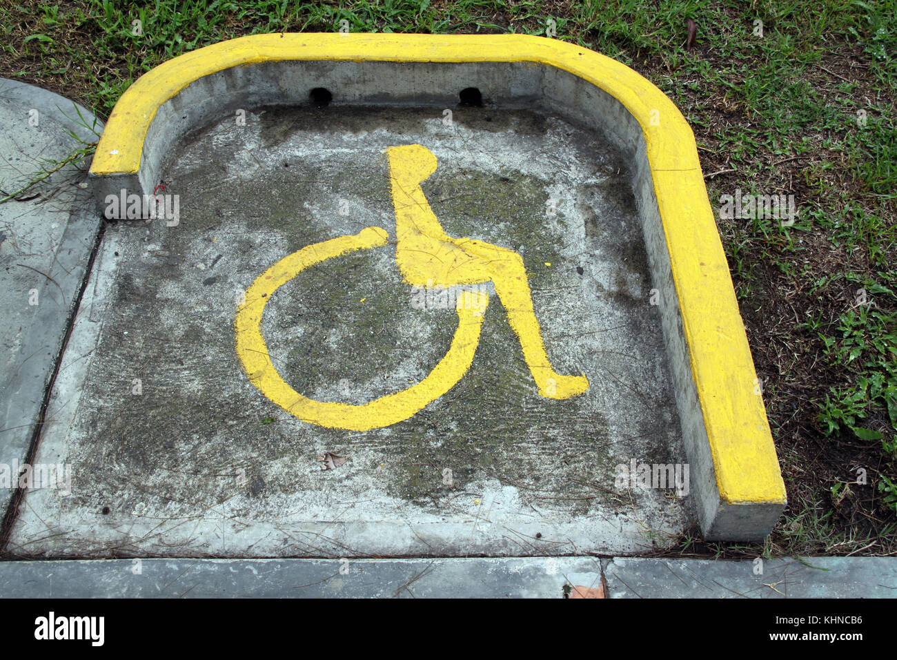 Sign and place for car invalid in perk Stock Photo - Alamy