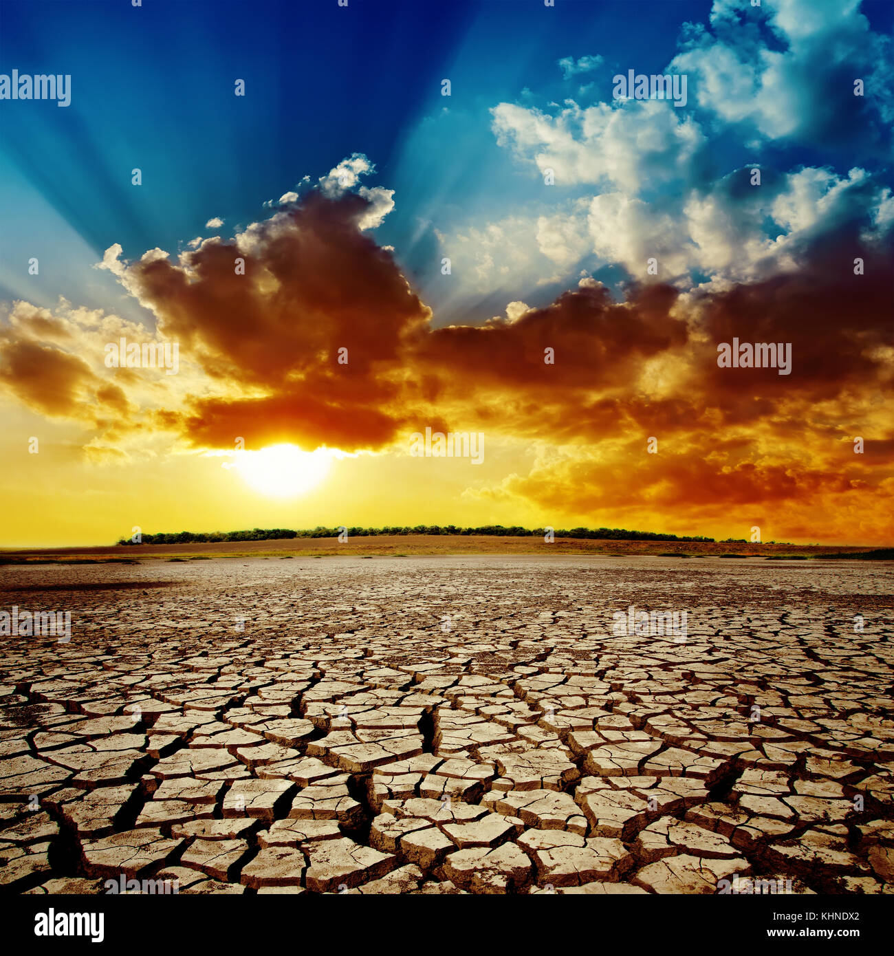 sunset in dramatic sky over desert Stock Photo - Alamy