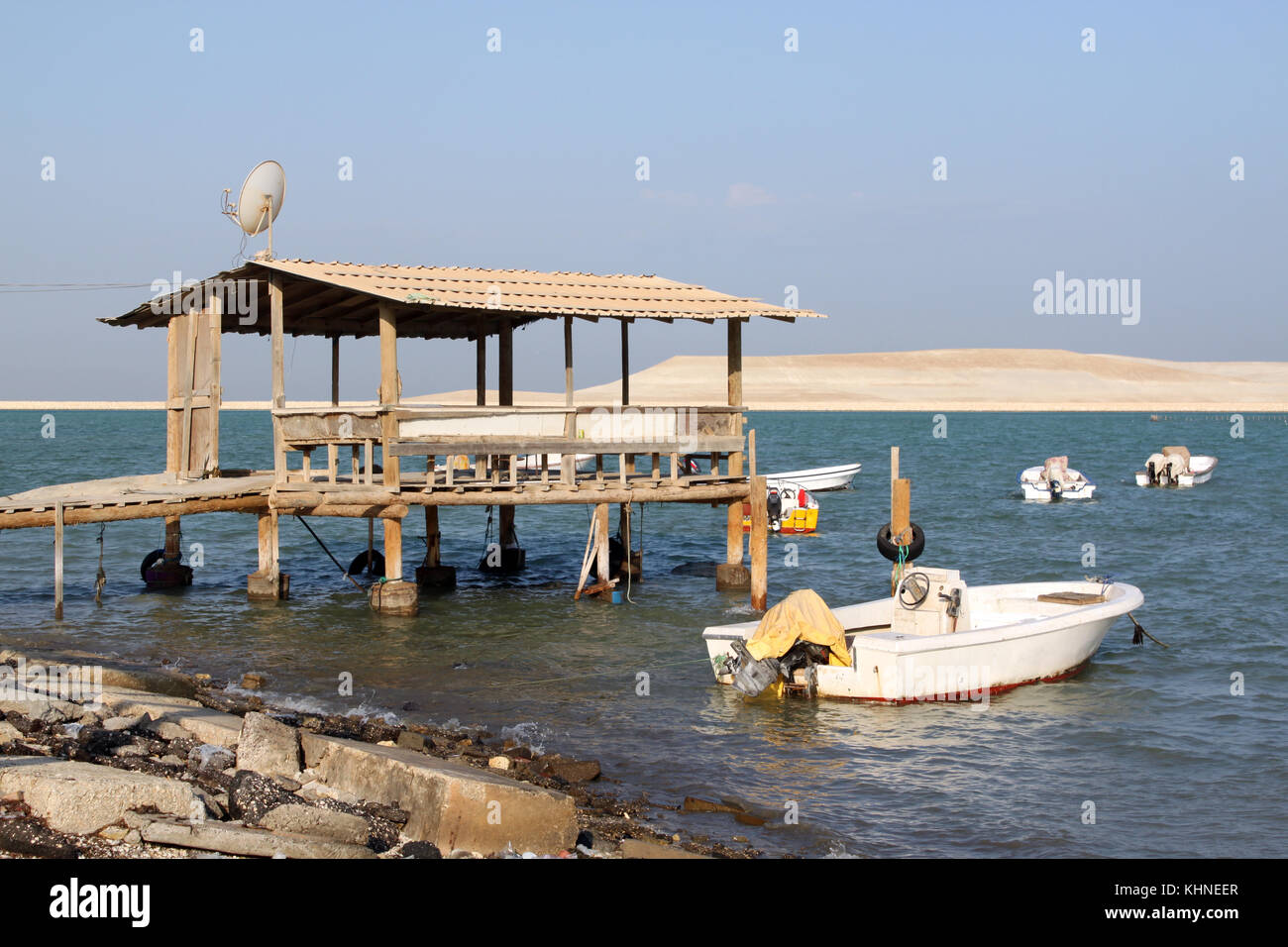 Boats and sea shore near Manama city, Bahrein Stock Photo - Alamy
