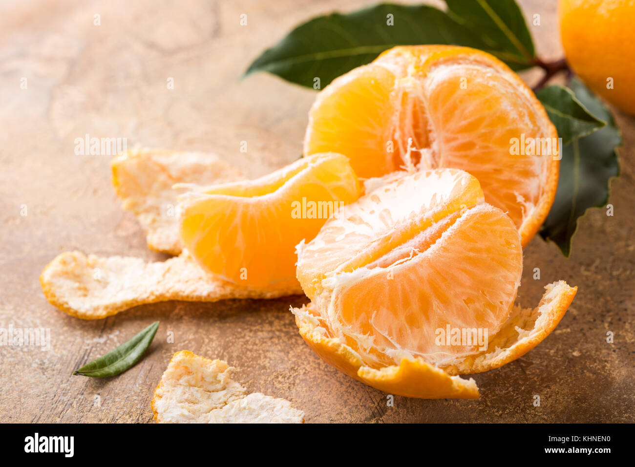 Fresh peeled mandarin tangerine Stock Photo - Alamy