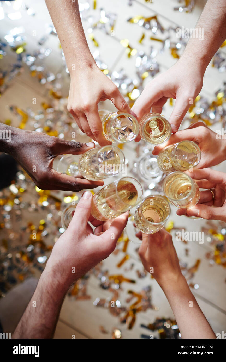 Overview of several human hands with flutes cheering up at party Stock ...