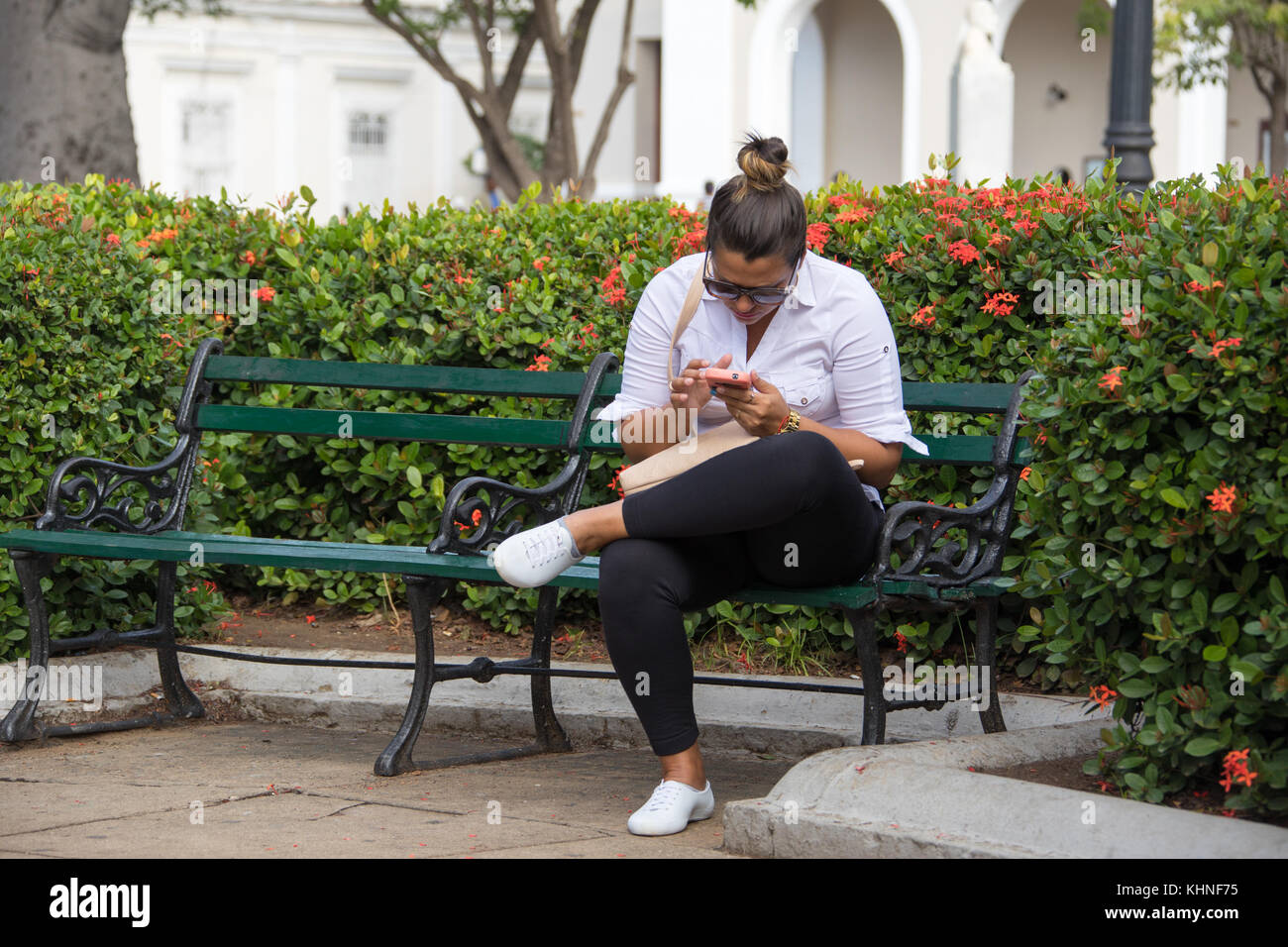 Cuban using mobile phone hi-res stock photography and images - Alamy
