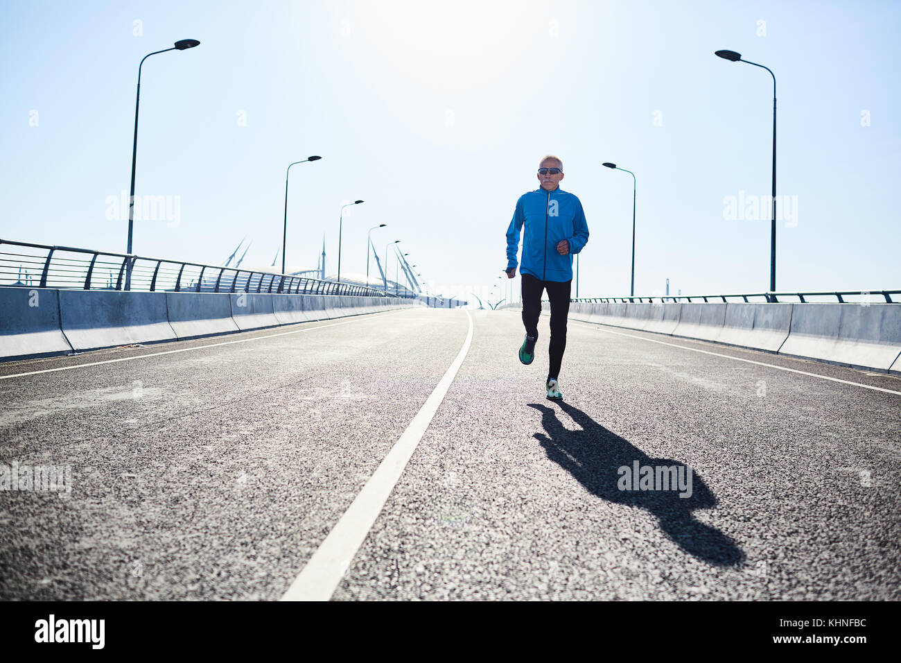Outline of active sportsman running forwards along cycling road Stock ...