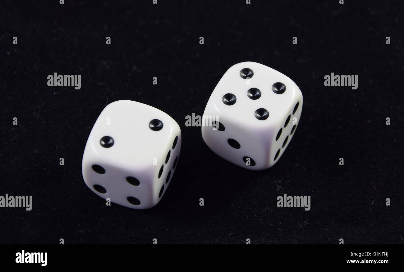 A pair white of dice showing Five and Two Stock Photo - Alamy