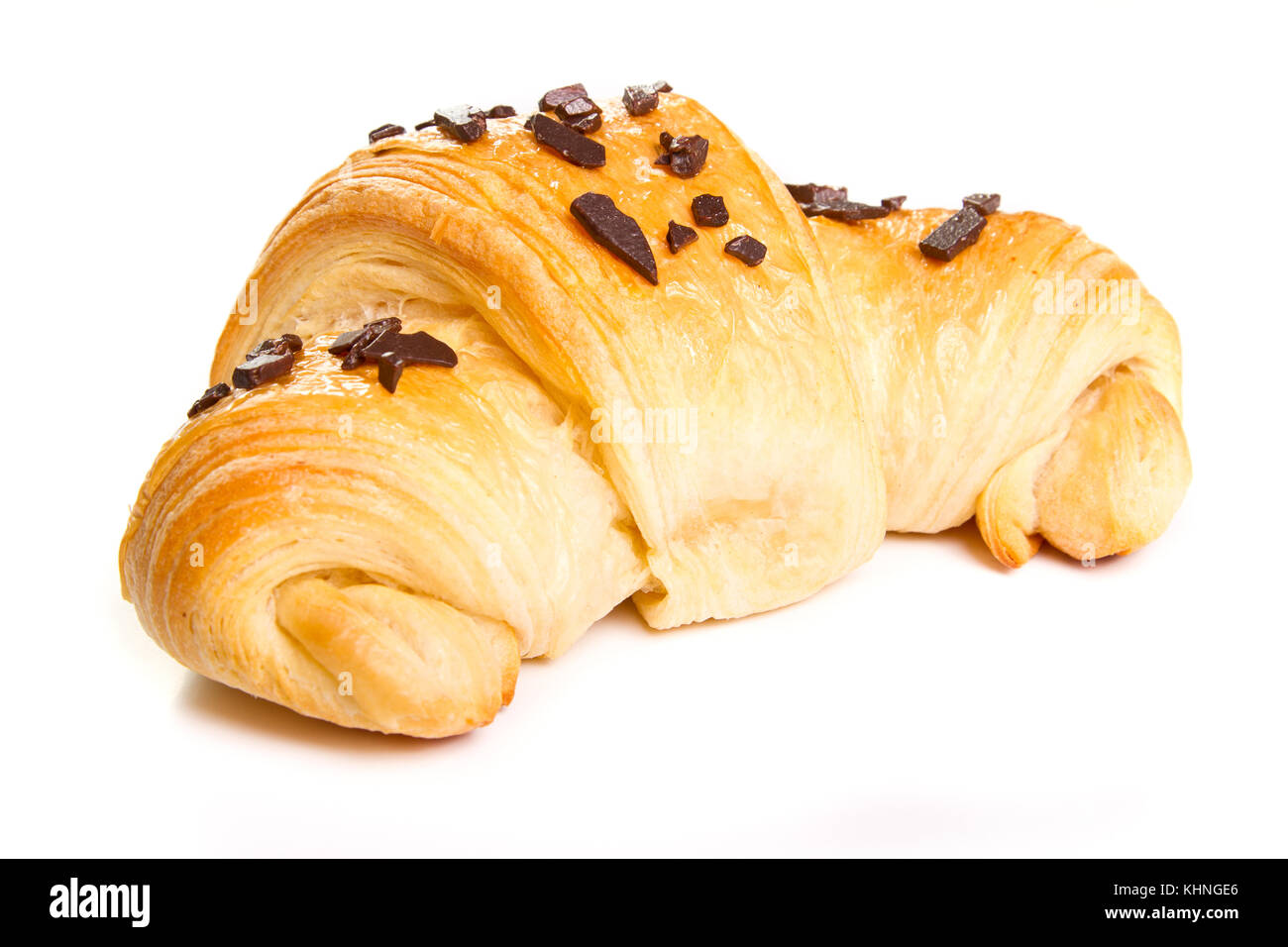 Chocolate chips croissant on white background Stock Photo - Alamy