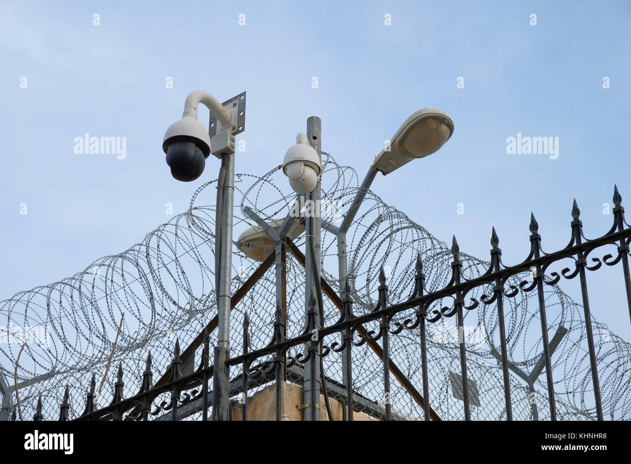 Surveillance cameras and barbed wires of the Israeli detention and ...