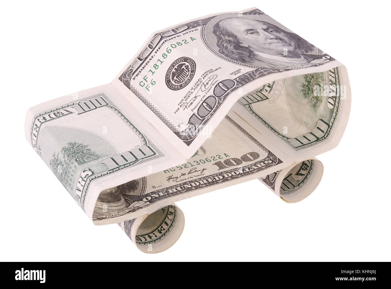 The car made of dollars isolated on white Stock Photo - Alamy