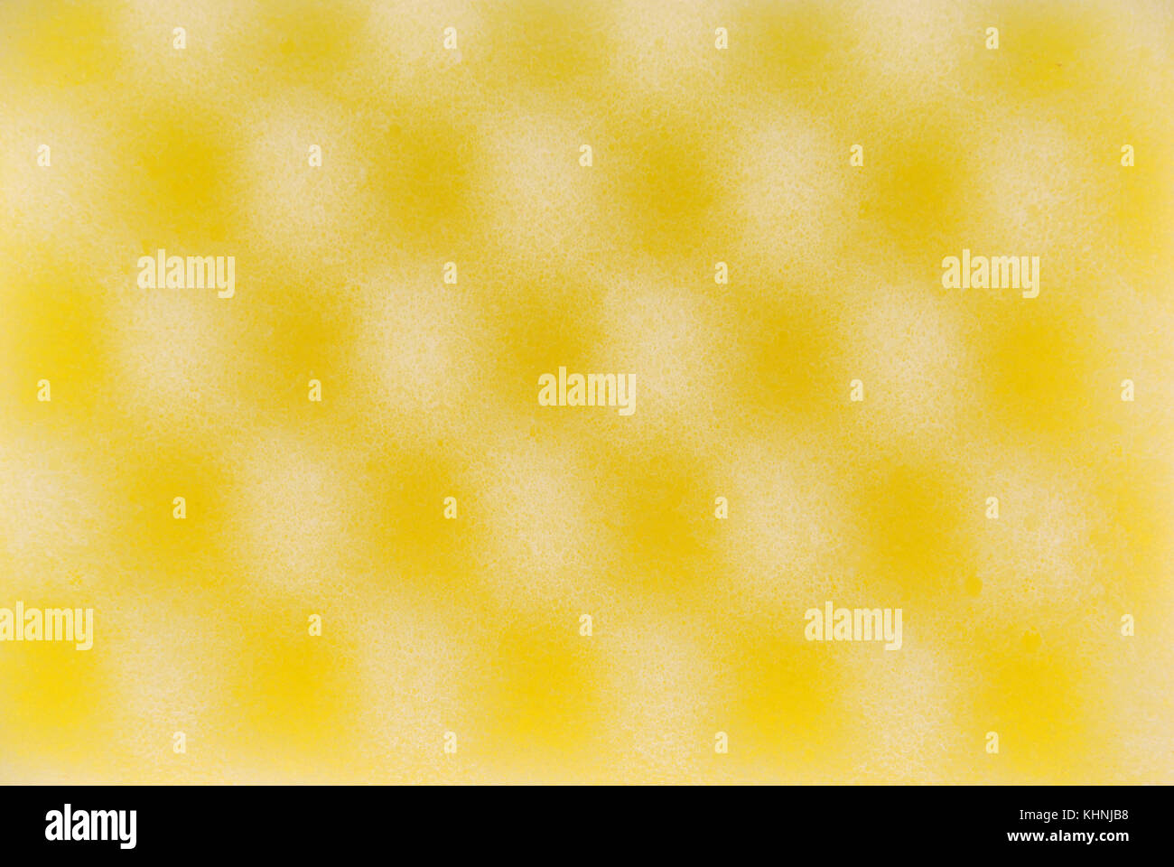 Yellow texture cellulose foam sponge. Background Stock Photo - Alamy