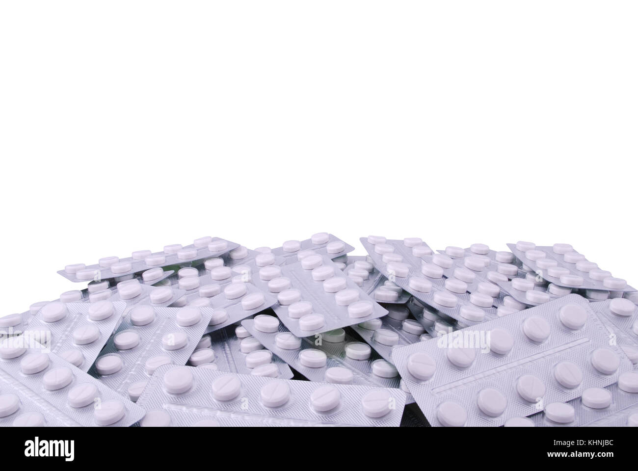 The big heap of tablets on a white background Stock Photo - Alamy