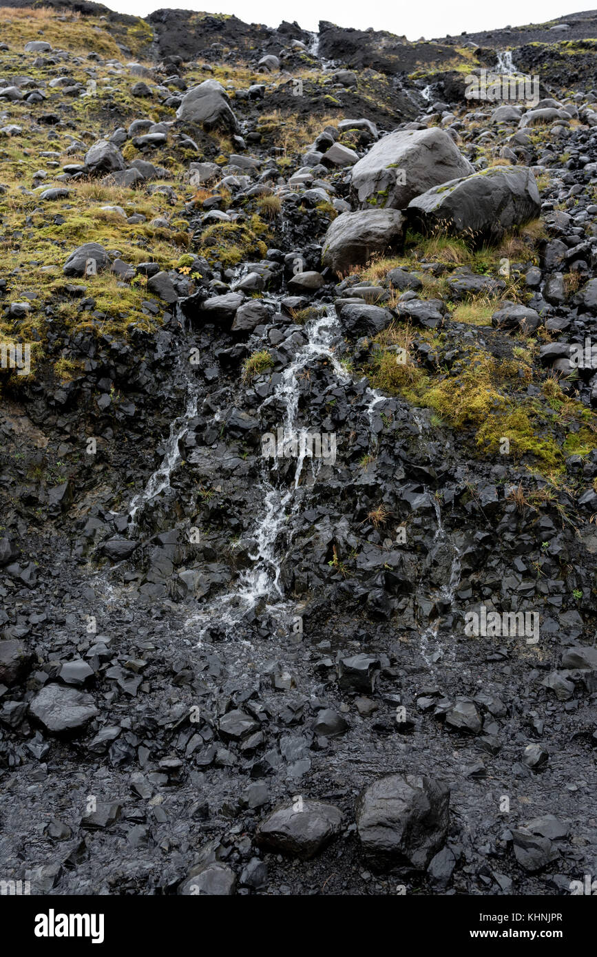 Small, but brave waterfall making Stock Photo - Alamy