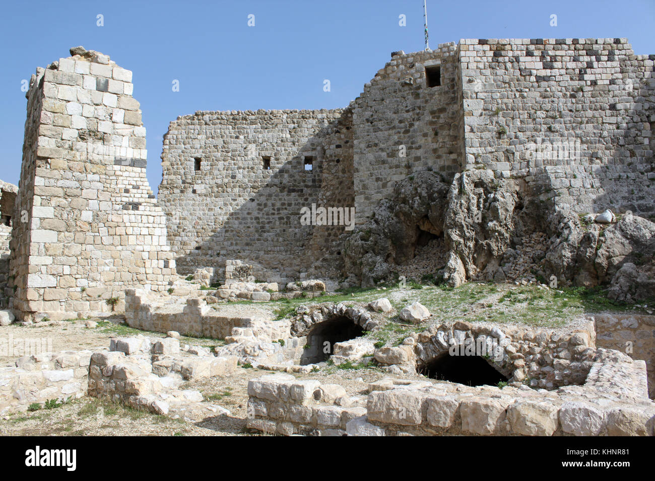Inner yard of big stone castle Masyaf in Syria Stock Photo - Alamy