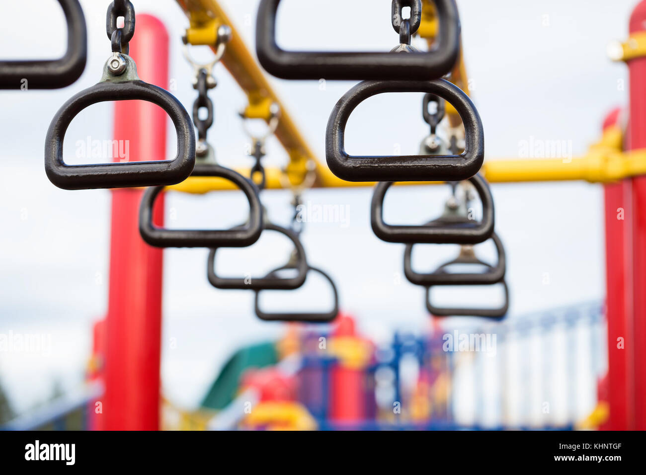 Swings in a playground Stock Photo - Alamy