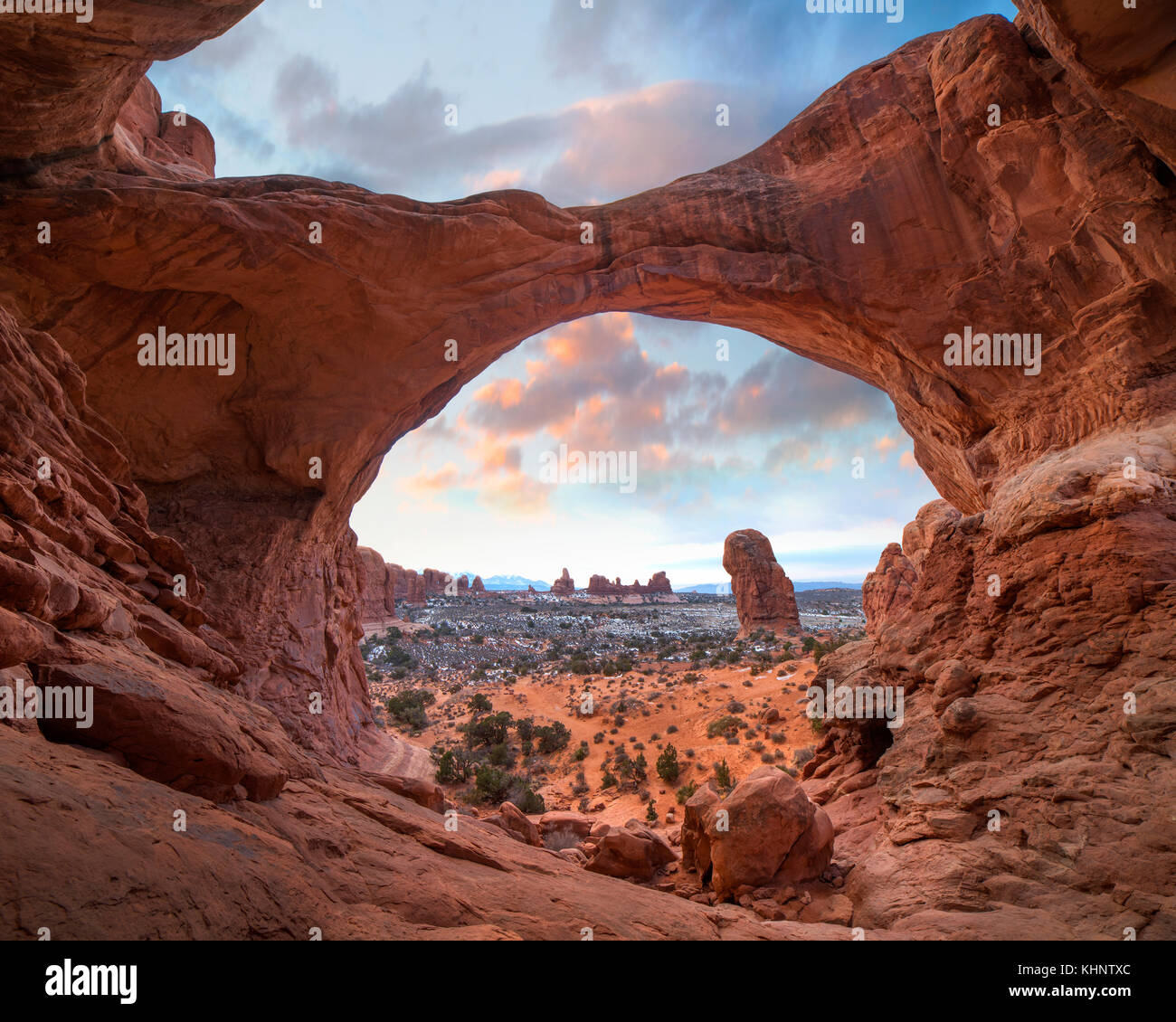 The Windows Section from Double Arch at sunrise, Arches National Park ...