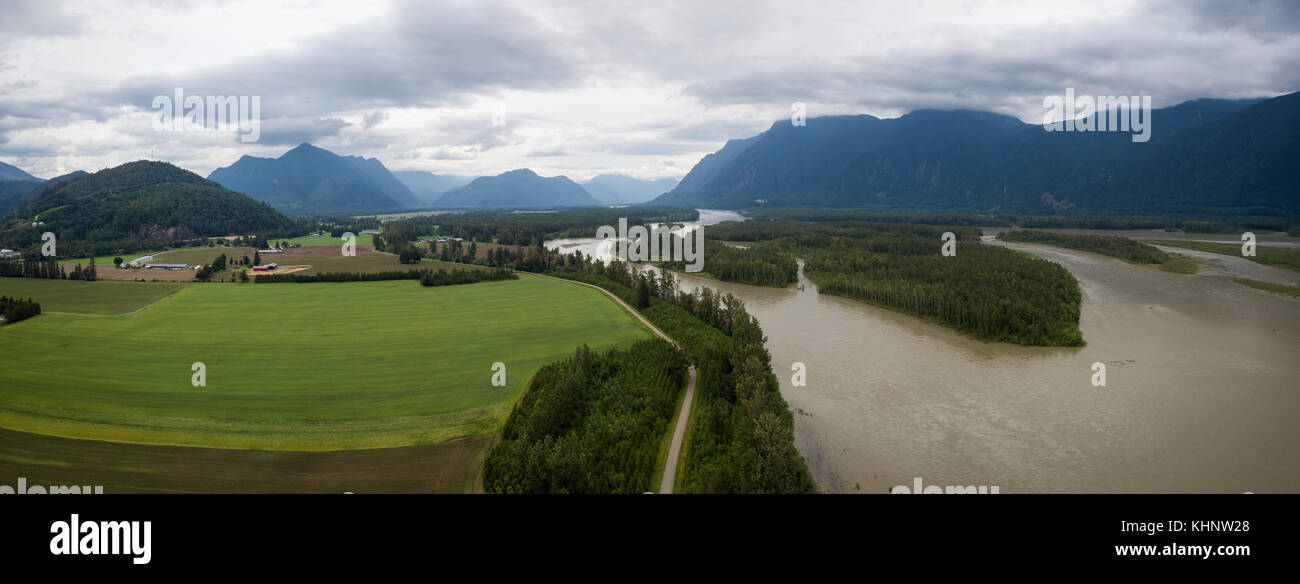 Aerial view of the Farm lands, fraser river and the beautiful mountain ...
