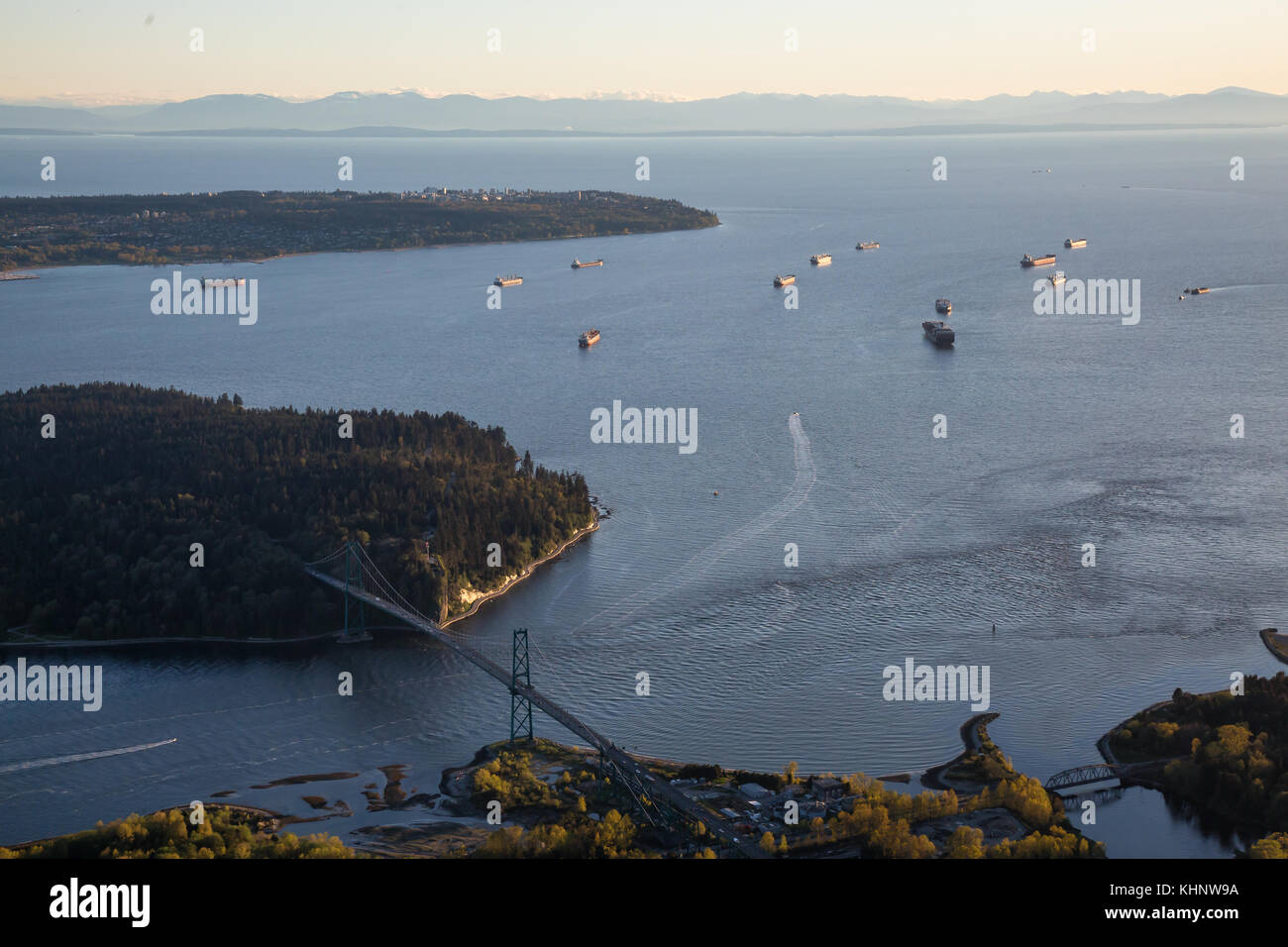 Aeriall view on Burrard Inlet, Lions Gate Bridge, Stanley Park and UBC ...
