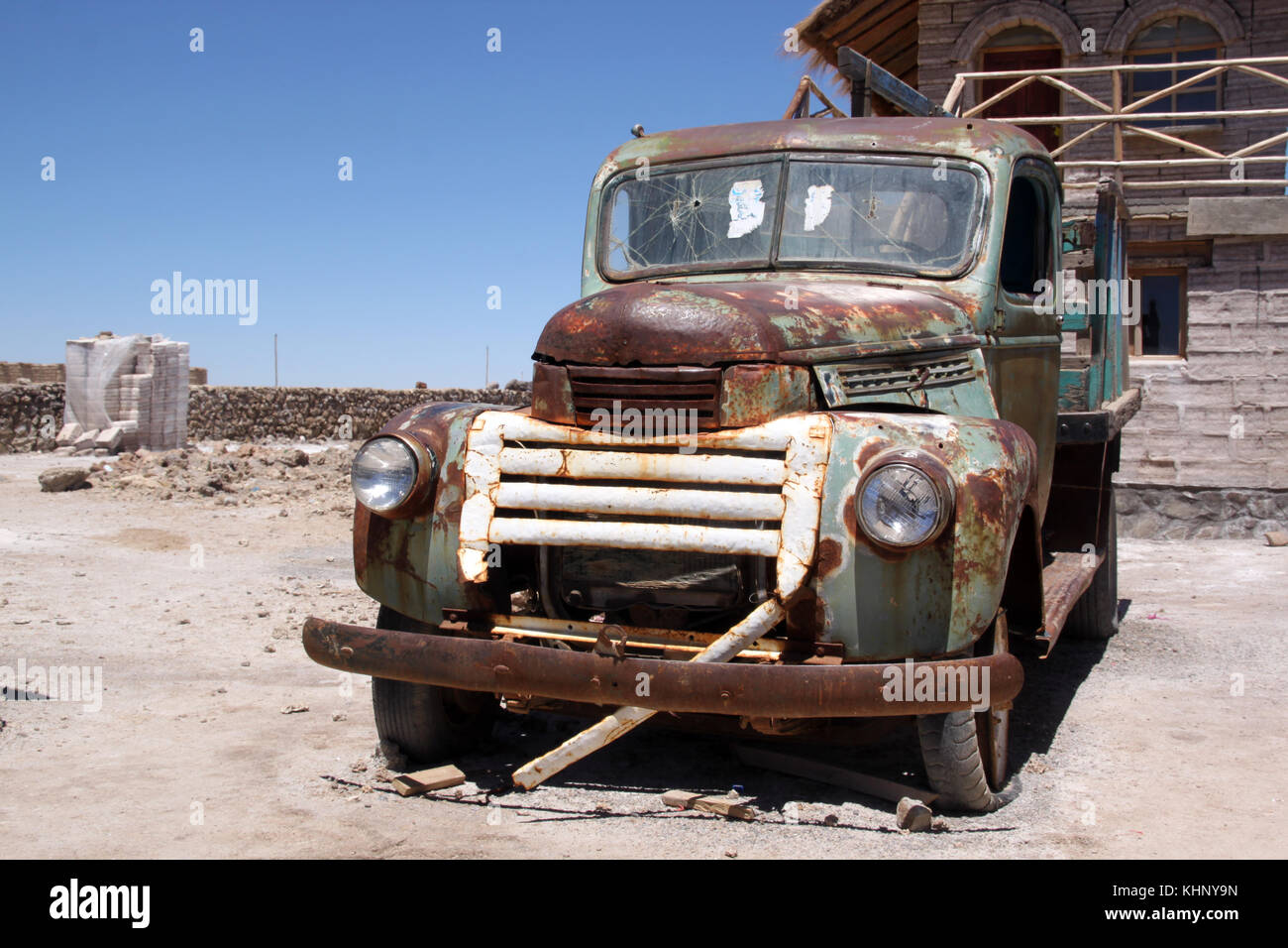 Rusty pick-up truck near the house in Bolivia Stock Photo - Alamy