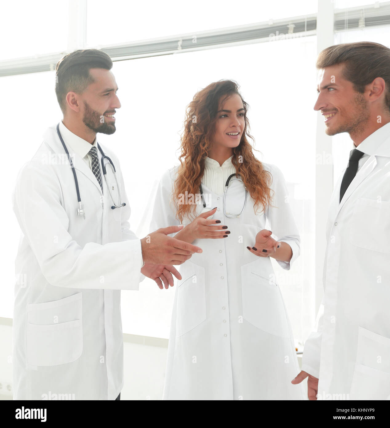 closeup of a group of doctors discussing Stock Photo - Alamy