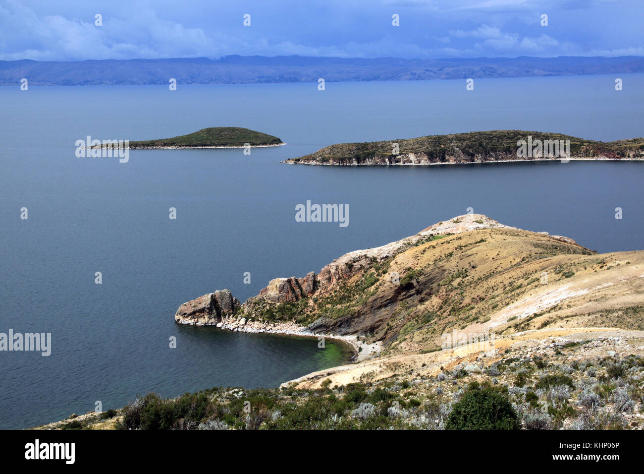Small island on lake Titicaca and coast of island Isla del Sol Stock ...