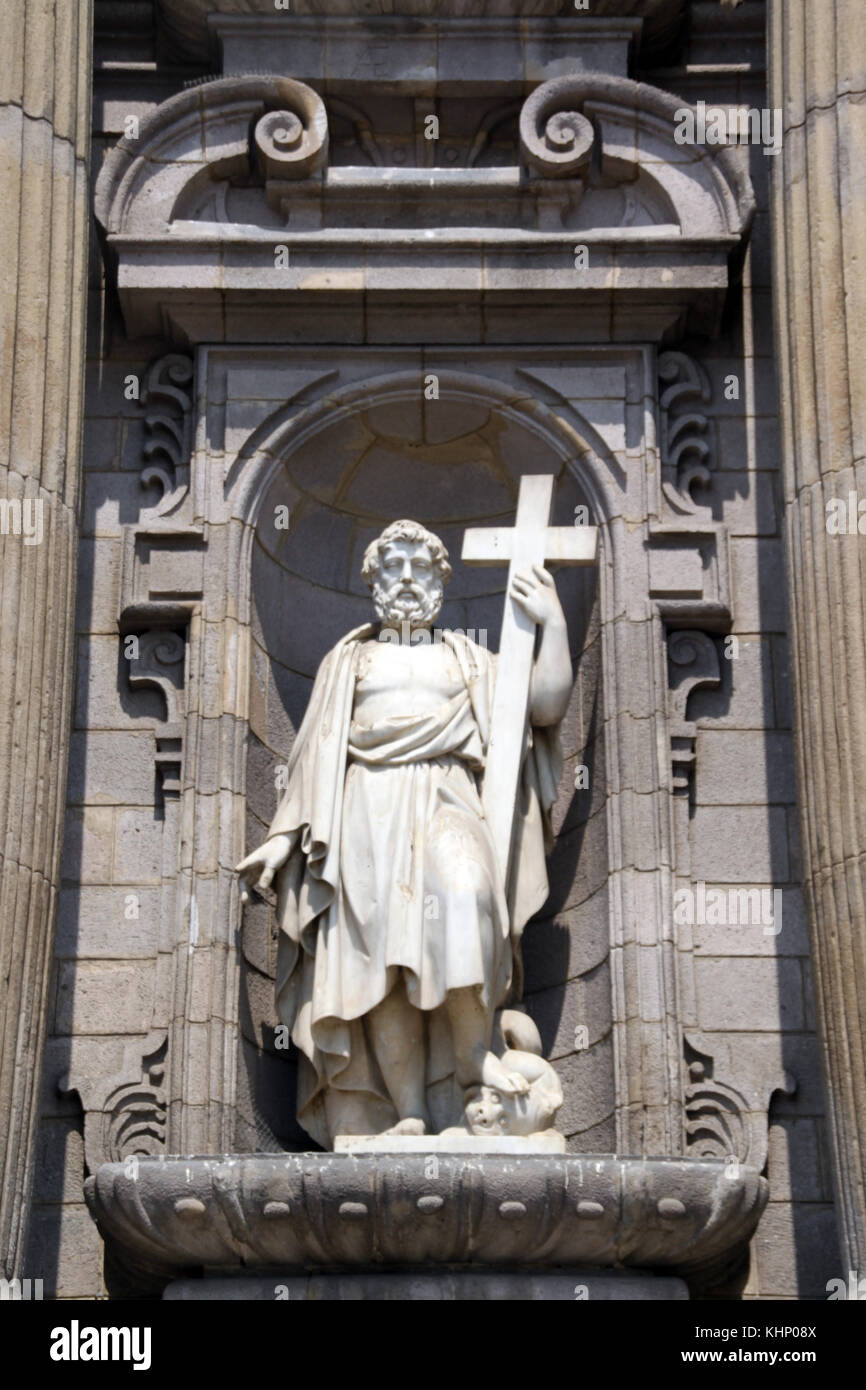 Statue of saint with cross on fasade of church San Fransisco in lima ...