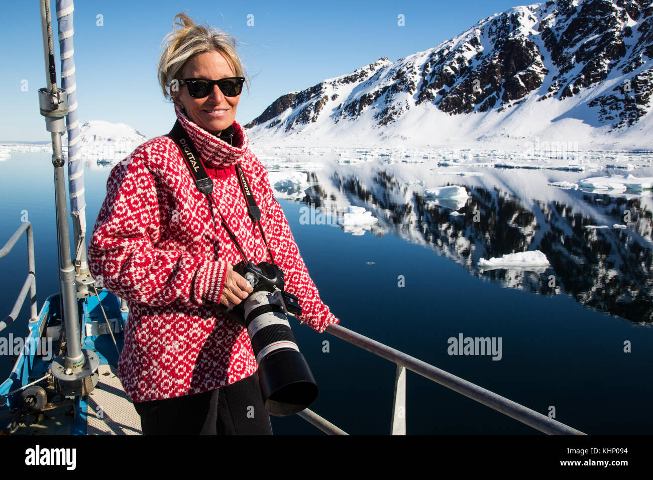 Photographer Jami Tarris on saildboat, Svalbard, Norway Stock Photo - Alamy