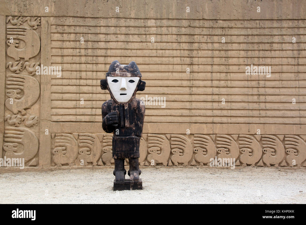 Statue near the wall in ruins of Chan Chan in north Peru Stock Photo ...
