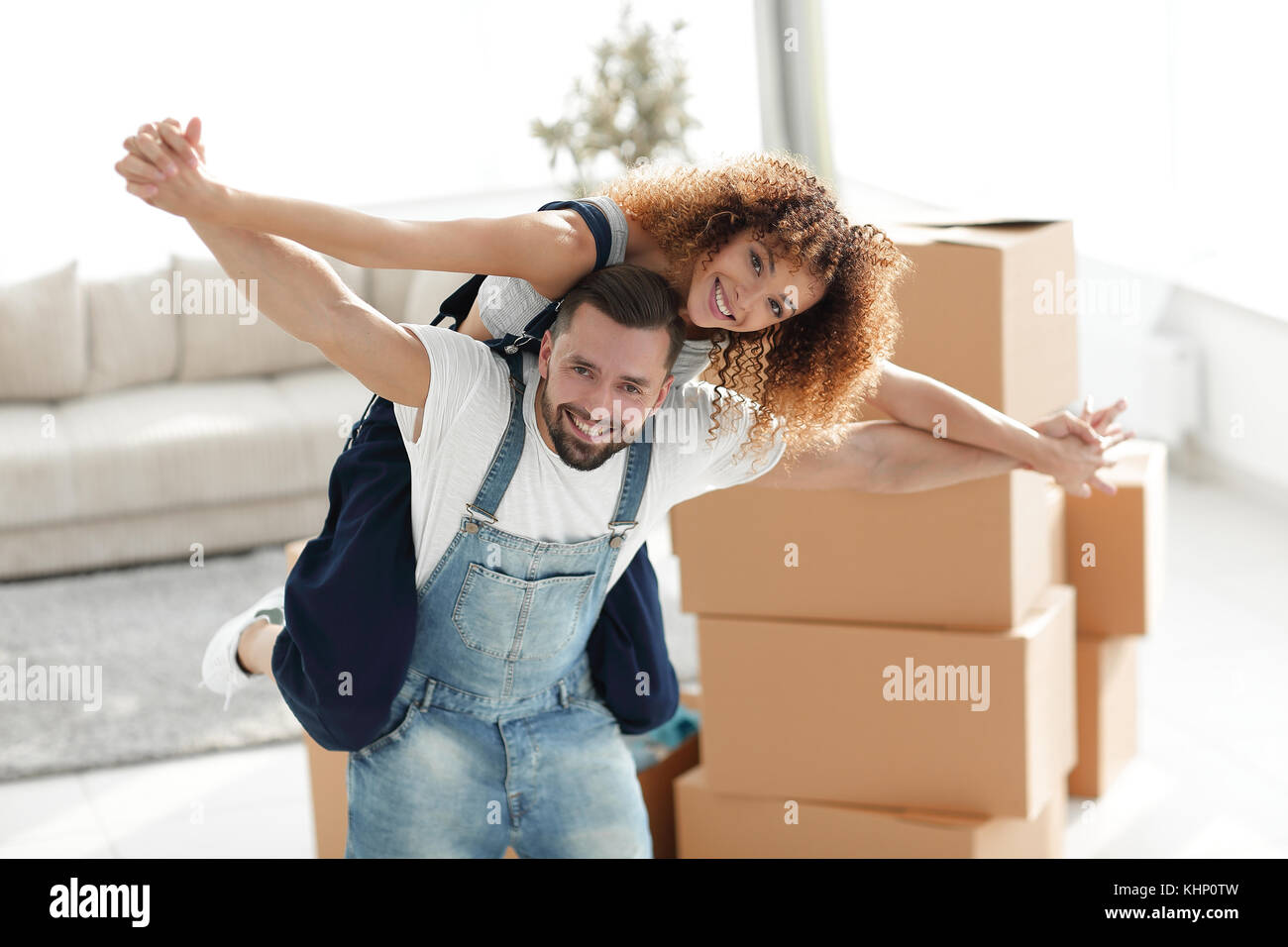 Happy married couple in a new house Stock Photo - Alamy