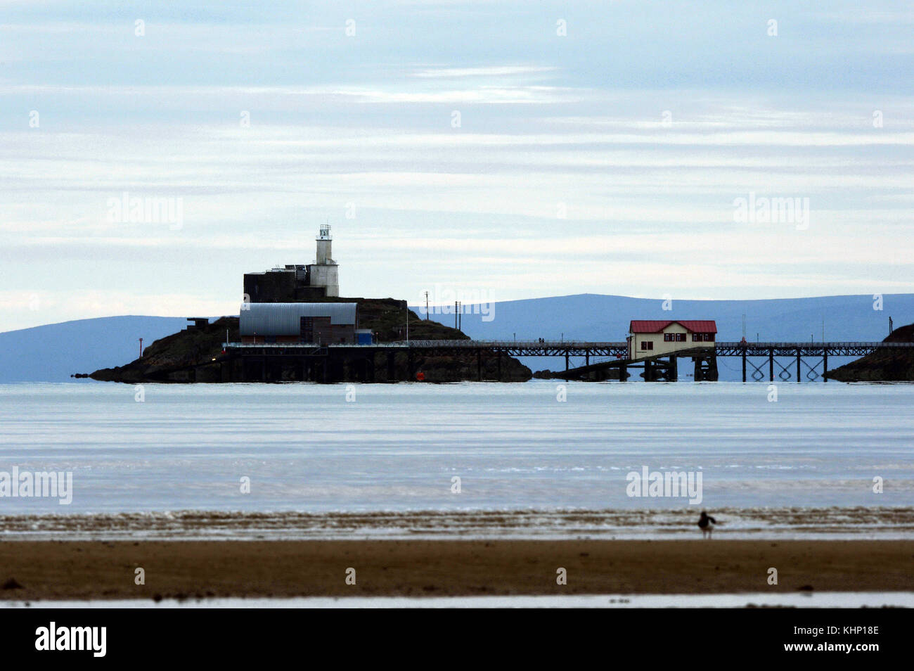 Mumbles lifeboat station, pier and lighthouse with Devon in the ...