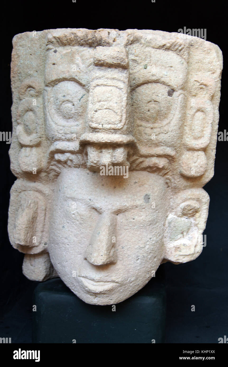 Stone head of maya warrior in Copan museum, Honduras Stock Photo - Alamy