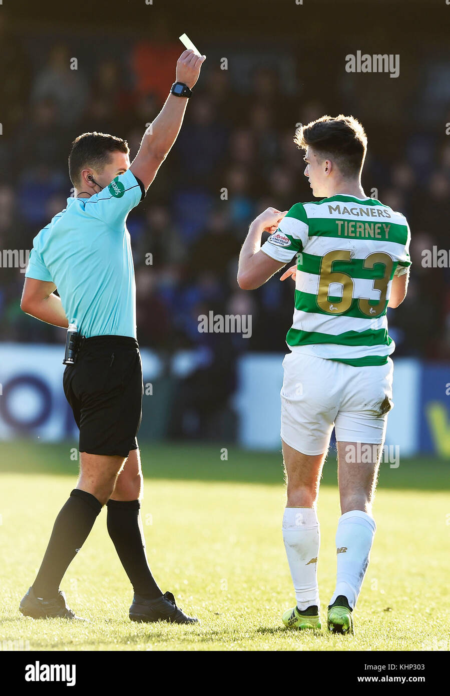 Referee Nick Walsh shows CelticÕs Kieran Tierney a yellow card during ...