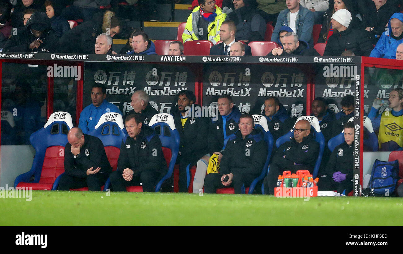 Everton's Wayne Rooney (centre) sits on the bench during the Premier ...