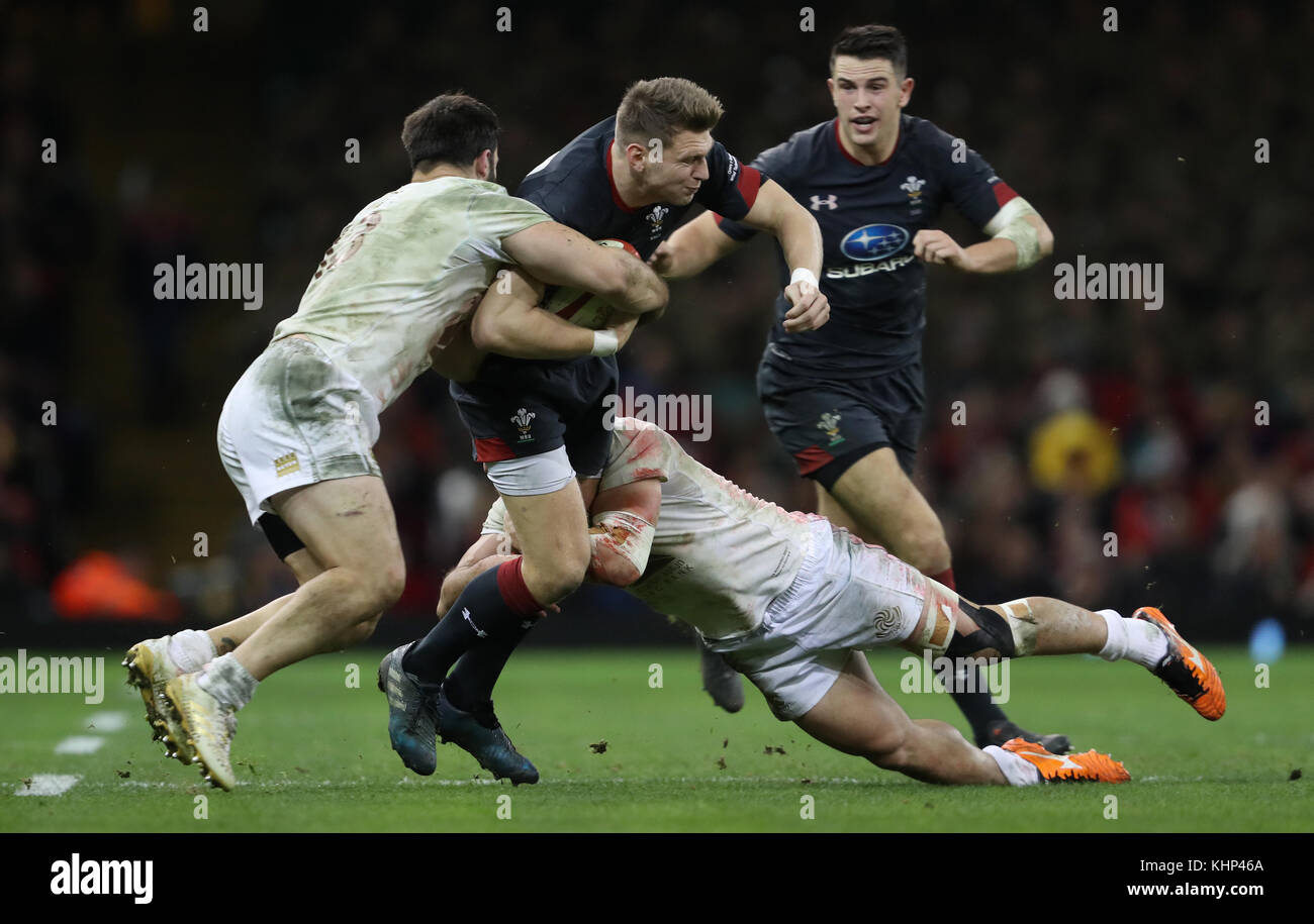 Wales Dan Biggar is tackled by Georgia's Merab Sharikadze and David ...