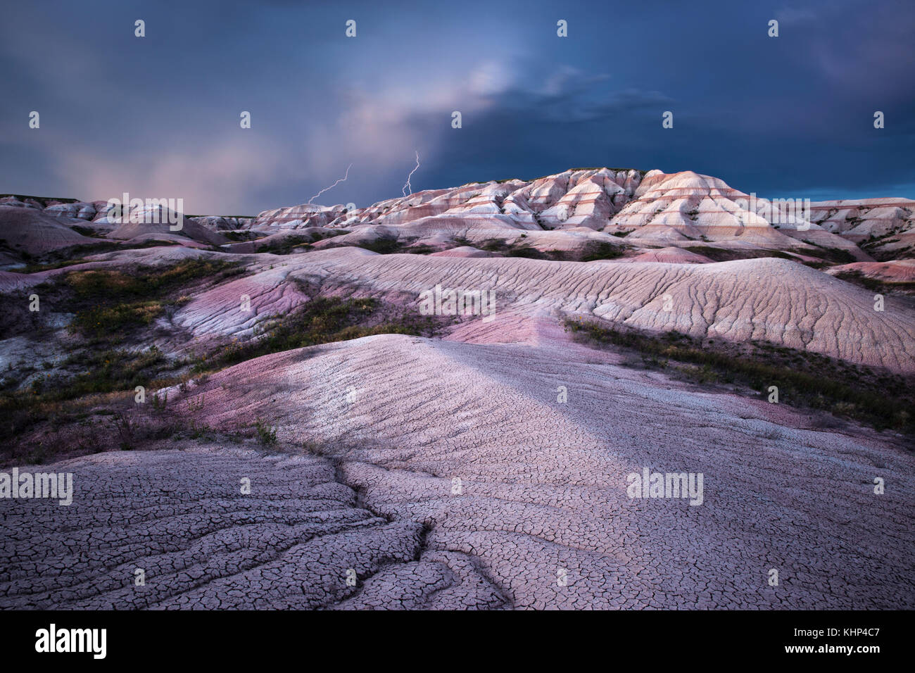 Lightning strikes over badlands, Badlands National Park, South Dakota ...